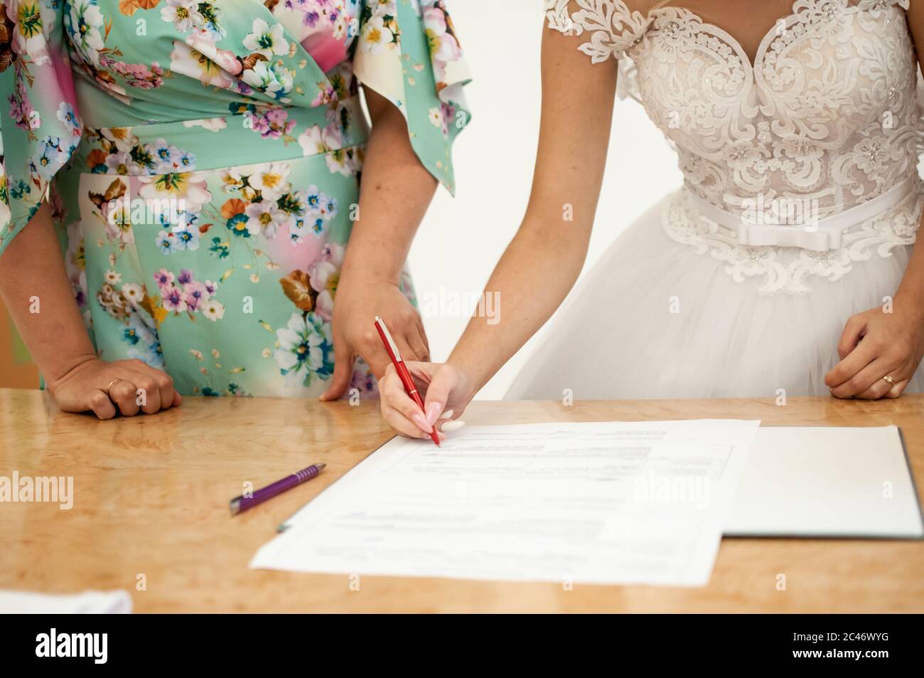 Marriage certificate signing bride hi-res stock photography and images ...