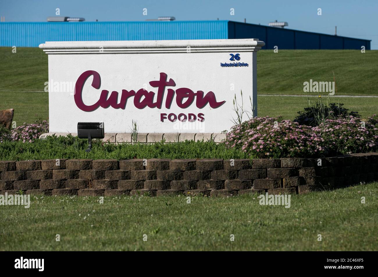 A logo sign outside of a facility occupied by Curation Foods in Hanover ...