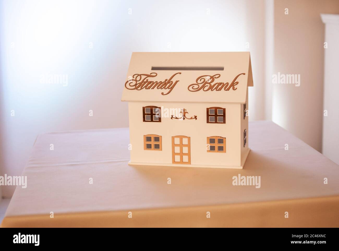 Home wooden family bank box Stock Photo - Alamy