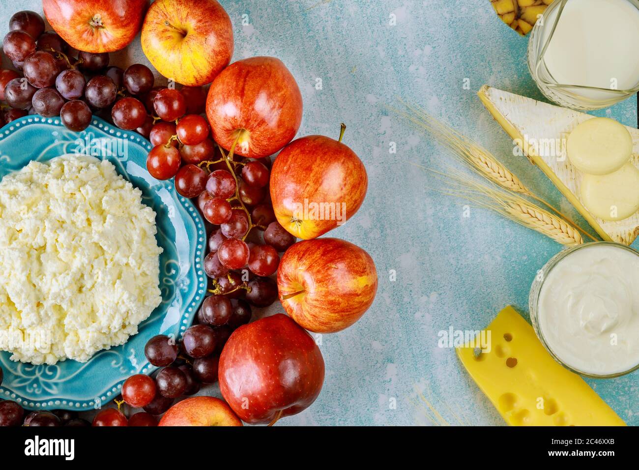 Fresh fruit and dairy products milk, cottage cheese for shavuot jewish ...