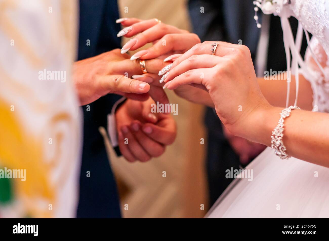 Wearing wedding ring on finger hi-res stock photography and images - Alamy