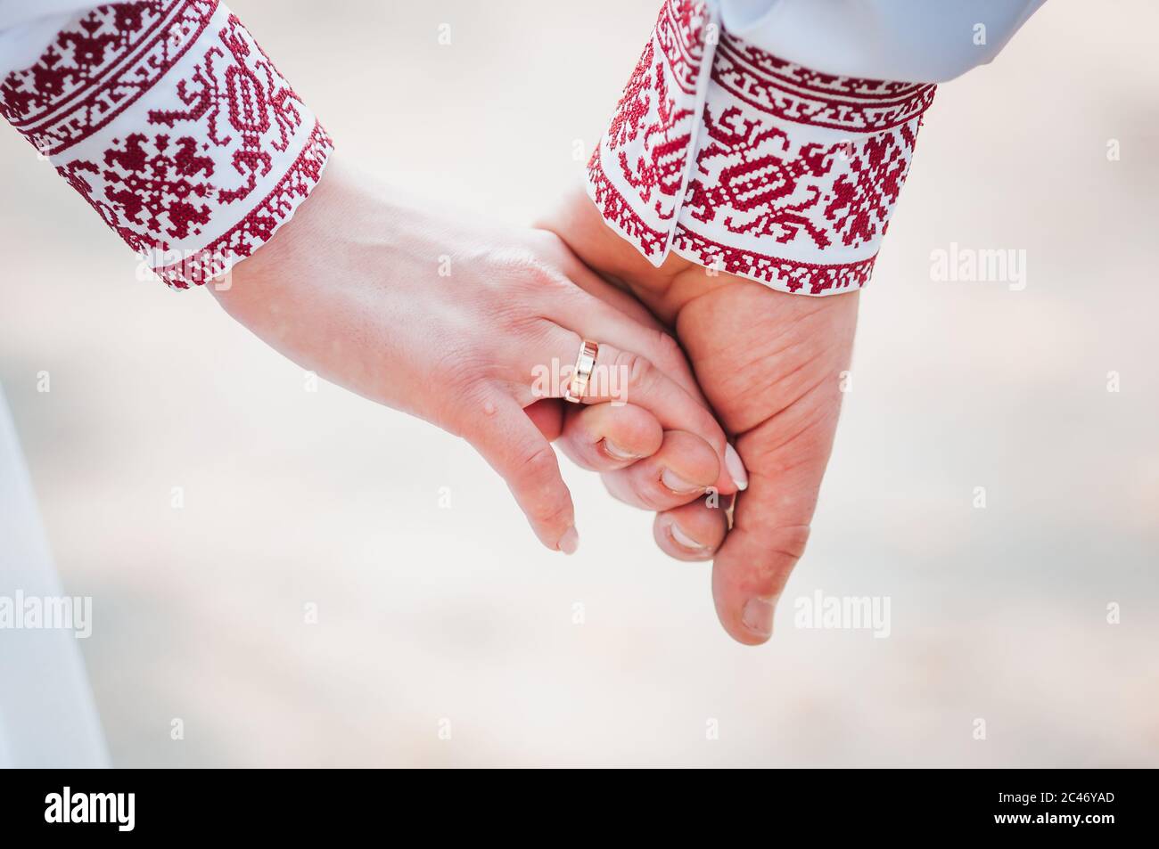 Couple of married holding hands Stock Photo - Alamy