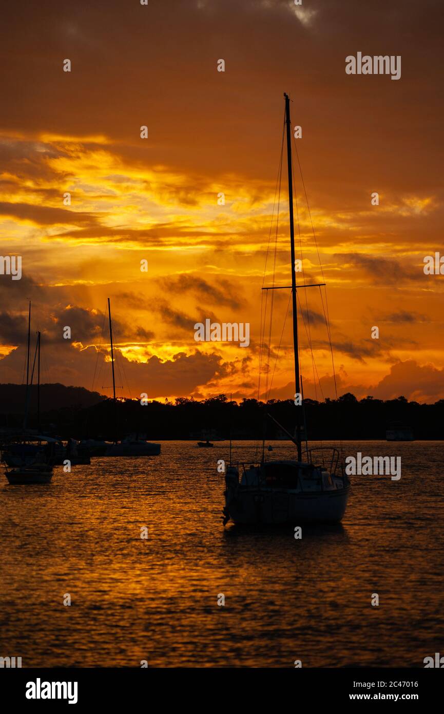 Vibrant sunset sailing boat hi-res stock photography and images - Alamy