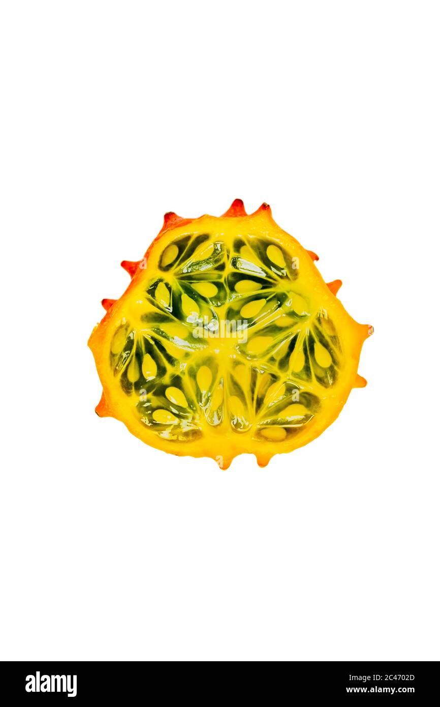Kiwano fruit cut in half isolated Stock Photo - Alamy