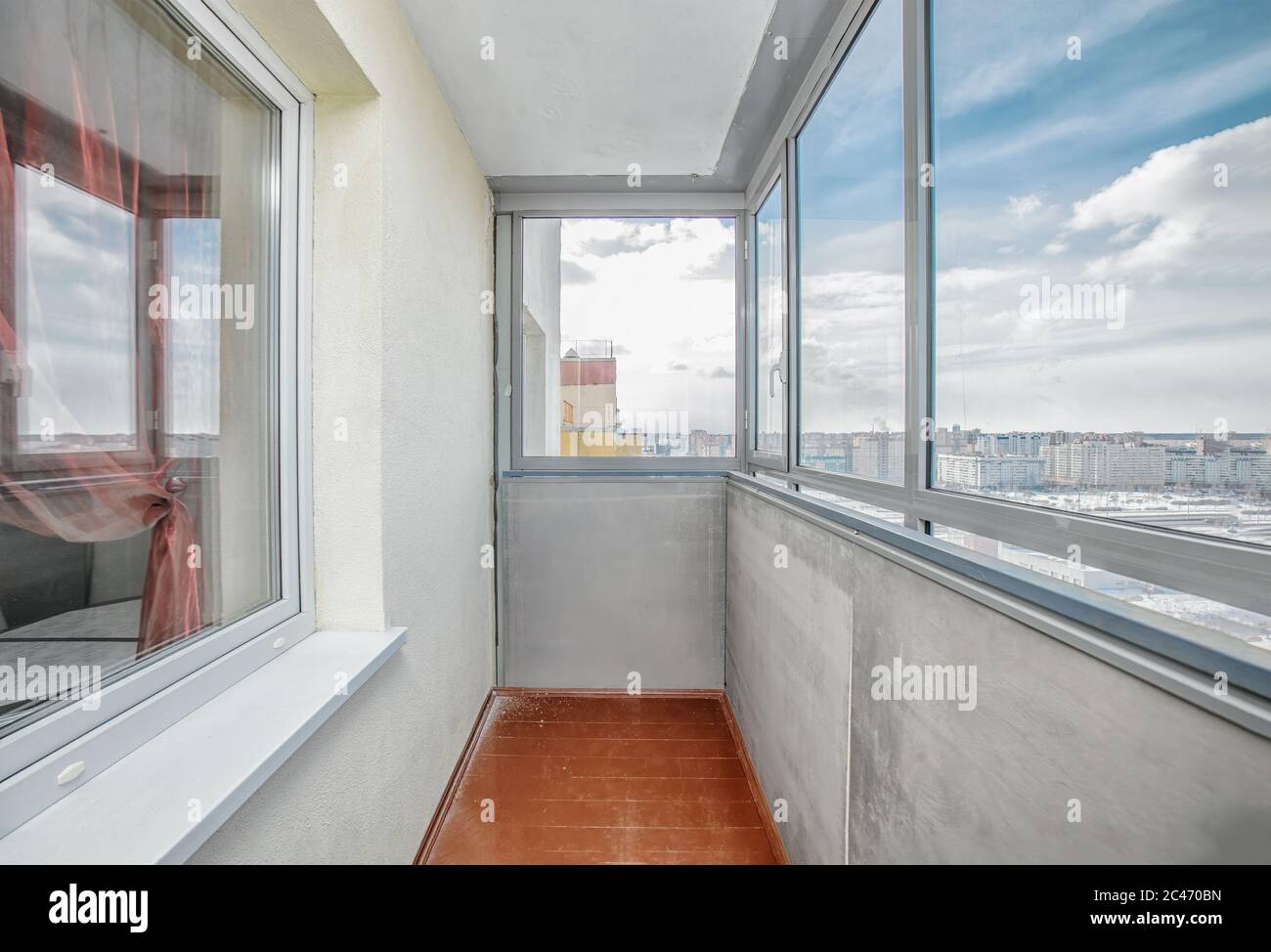 Small old common open balcony interior in high residential apartment ...