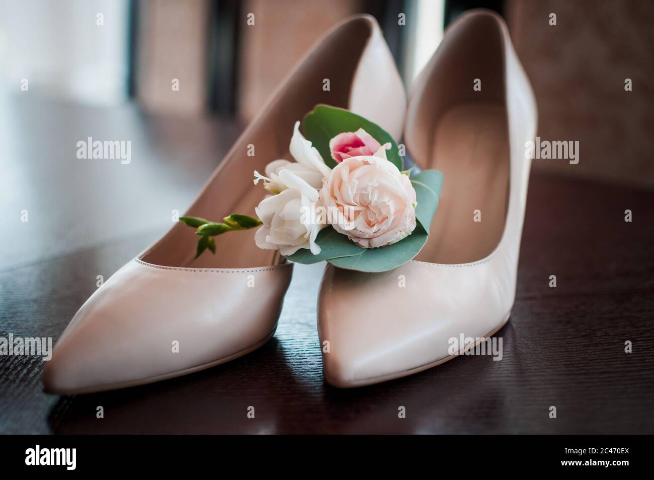 Women's high heel shoes with flowers inside Stock Photo - Alamy