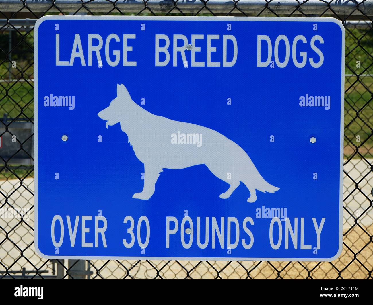 Dog park sign large breed dogs only Stock Photo - Alamy