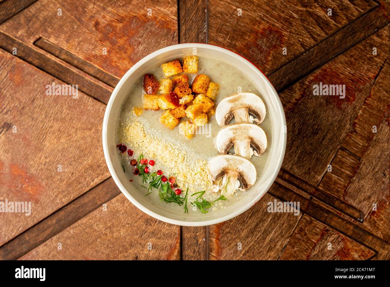 Creamy pureed mushroom soup top view Stock Photo - Alamy
