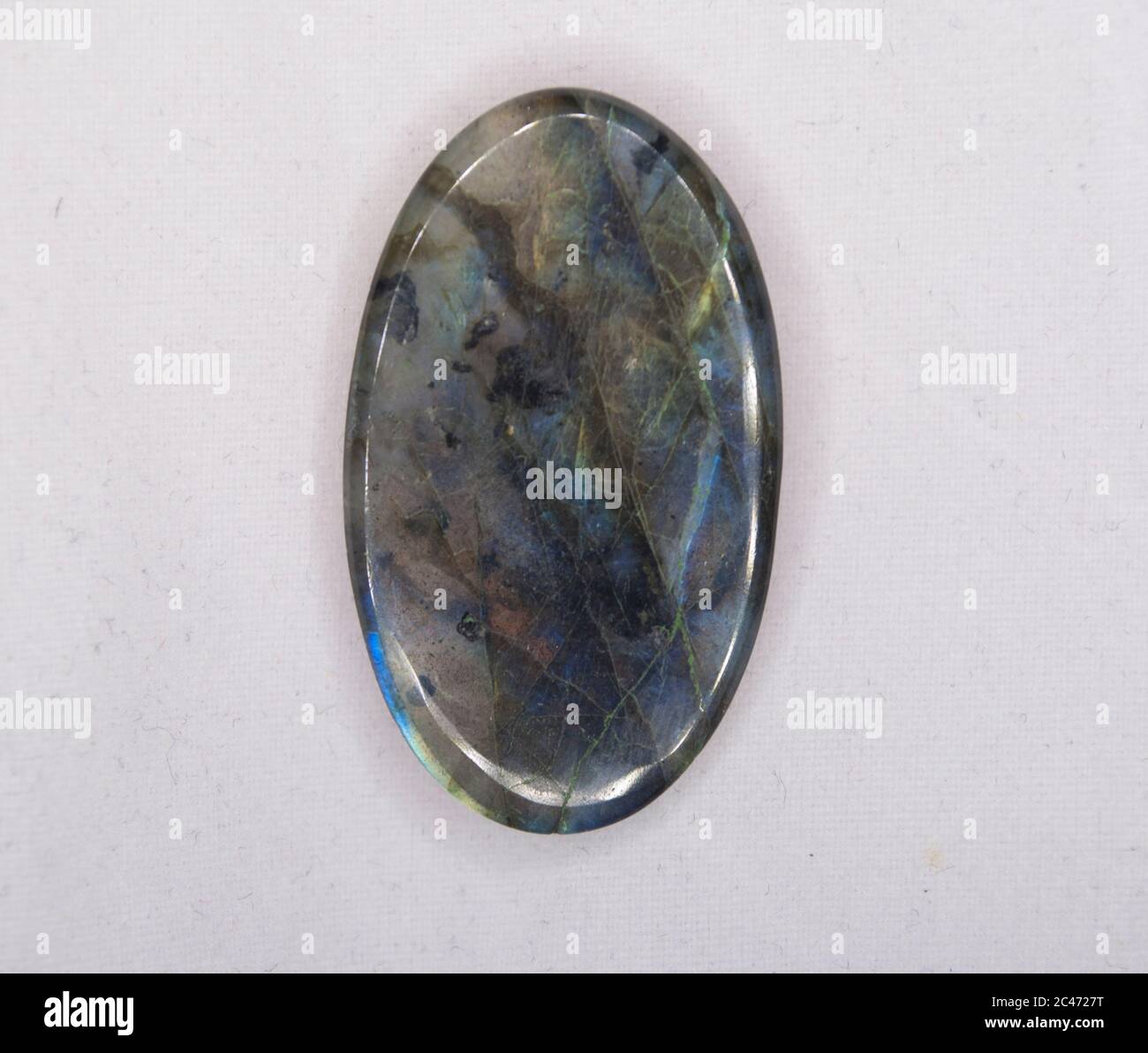 Natural oval labradorite gem on the white background Stock Photo - Alamy