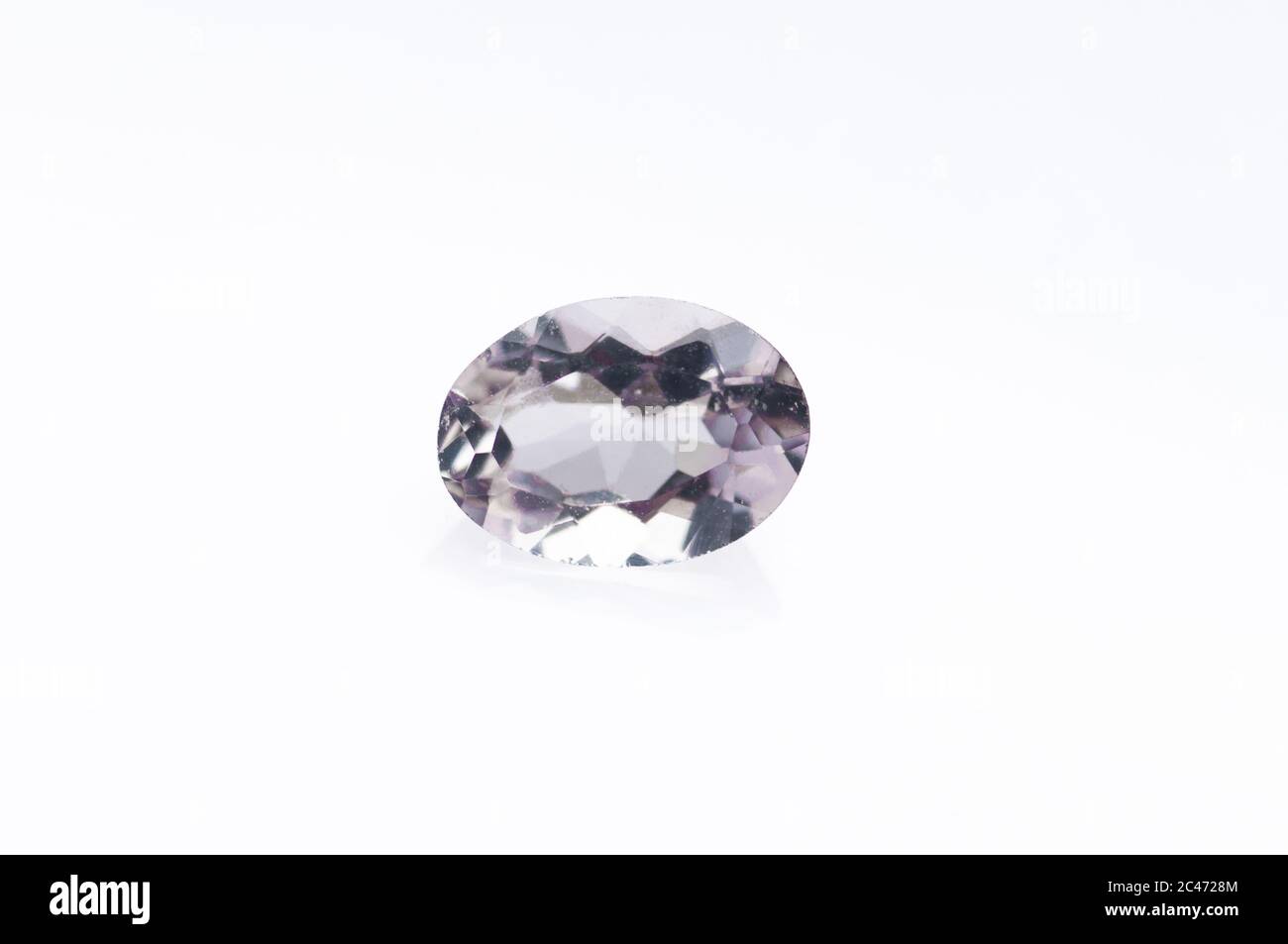 natural violet morganite oval shape on the white background Stock Photo ...
