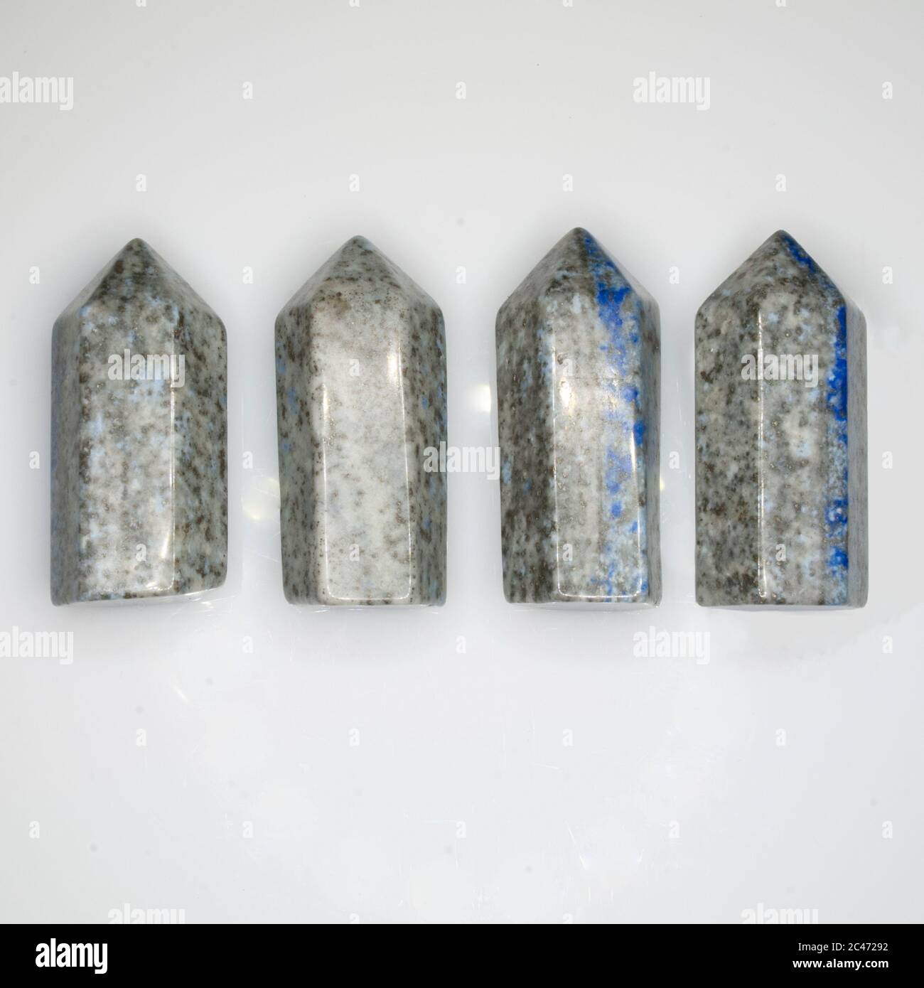 Natural lapis prism on the white background Stock Photo - Alamy