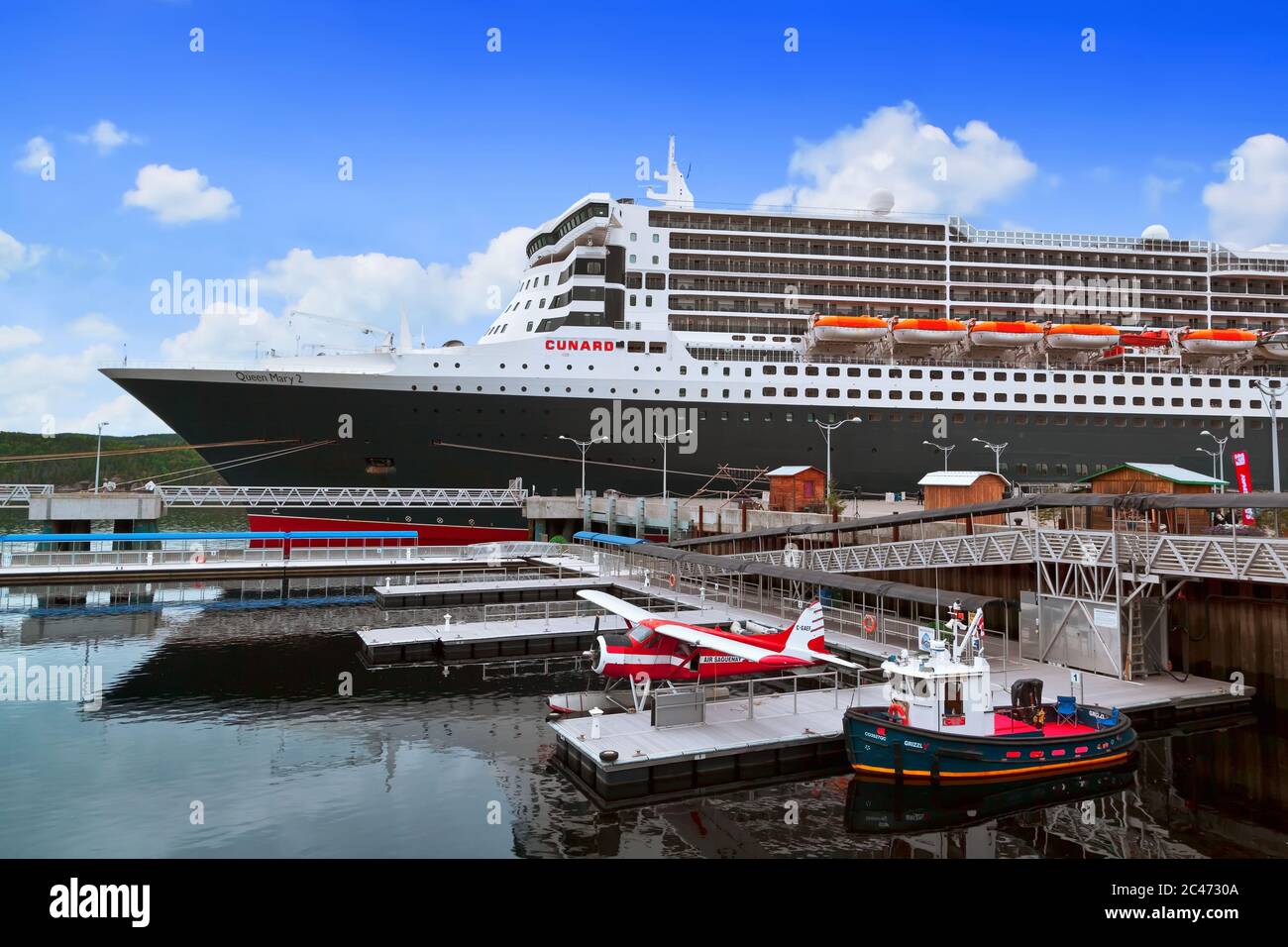 Cunard cruise ship docked at port Saguenay Stock Photo - Alamy