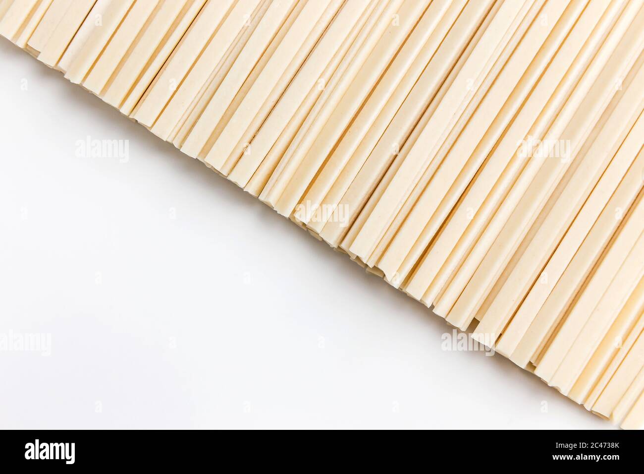 Raw udon noodles on white, horizontal photo Stock Photo - Alamy