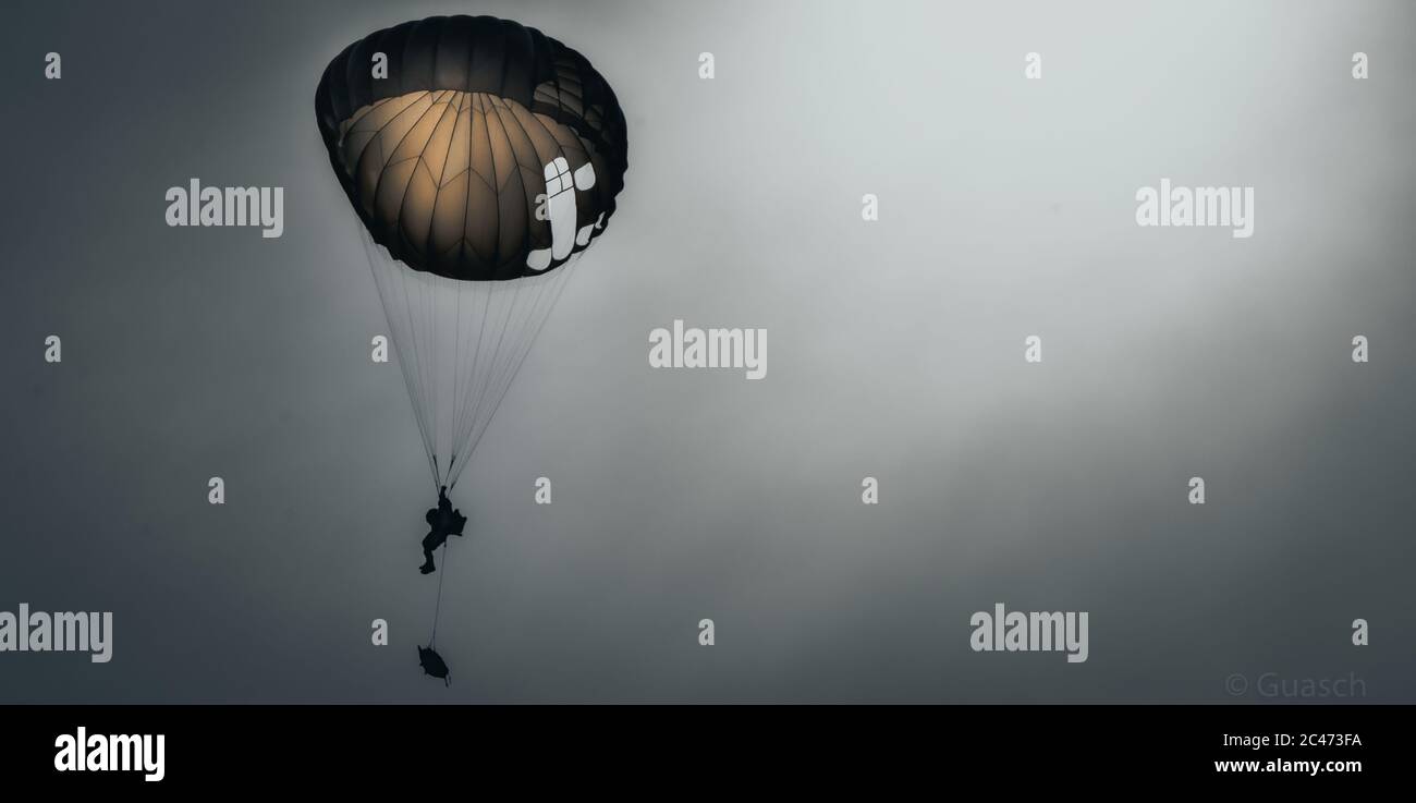 Amazing shot of an airborne forces soldier flying in the sky Stock ...