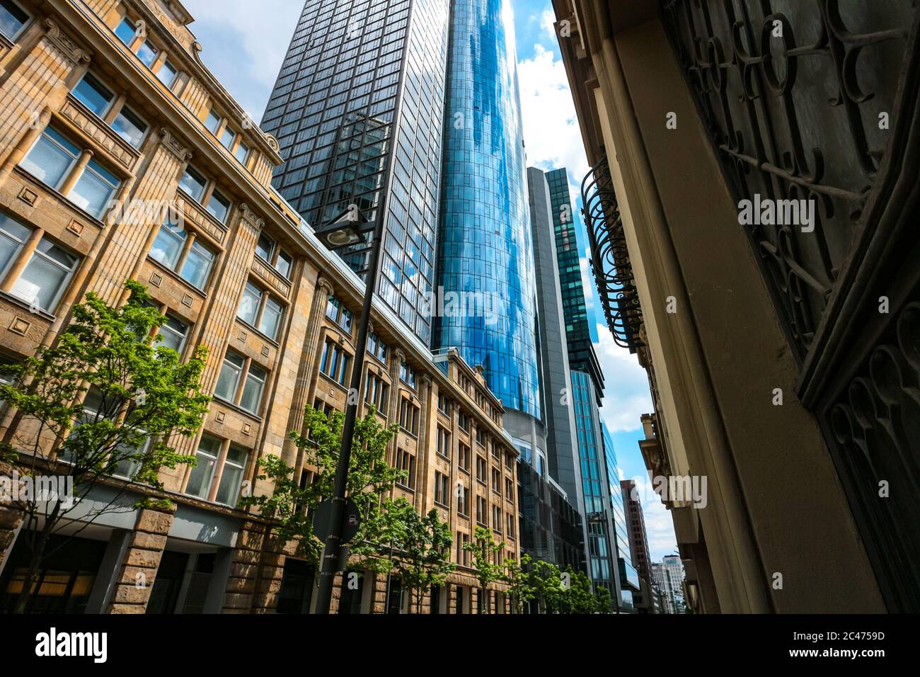 Maintower and Omniturm skyscrapers rise up behind historical buildings ...