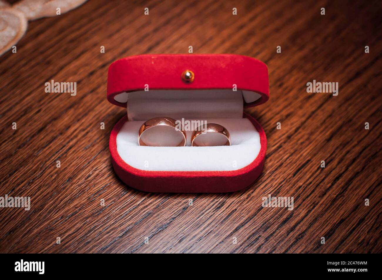 Pair of gold wedding rings in the red box Stock Photo - Alamy