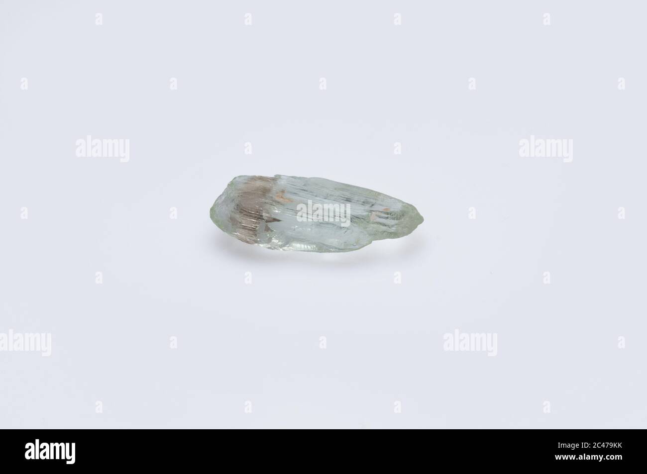 Natural beryl rough on the white background Stock Photo - Alamy