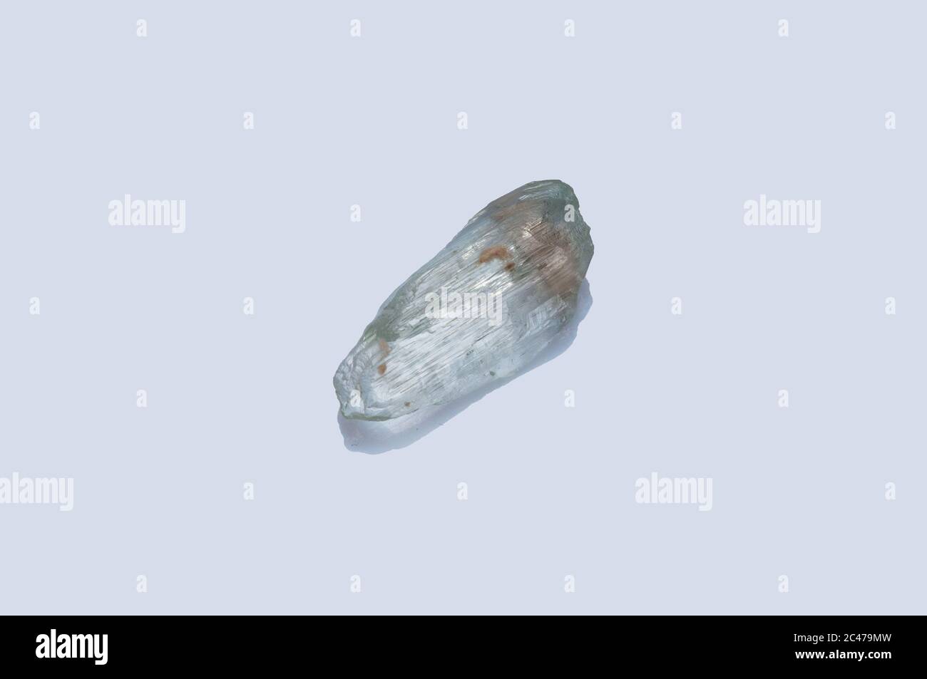 Natural beryl rough on the white background Stock Photo - Alamy