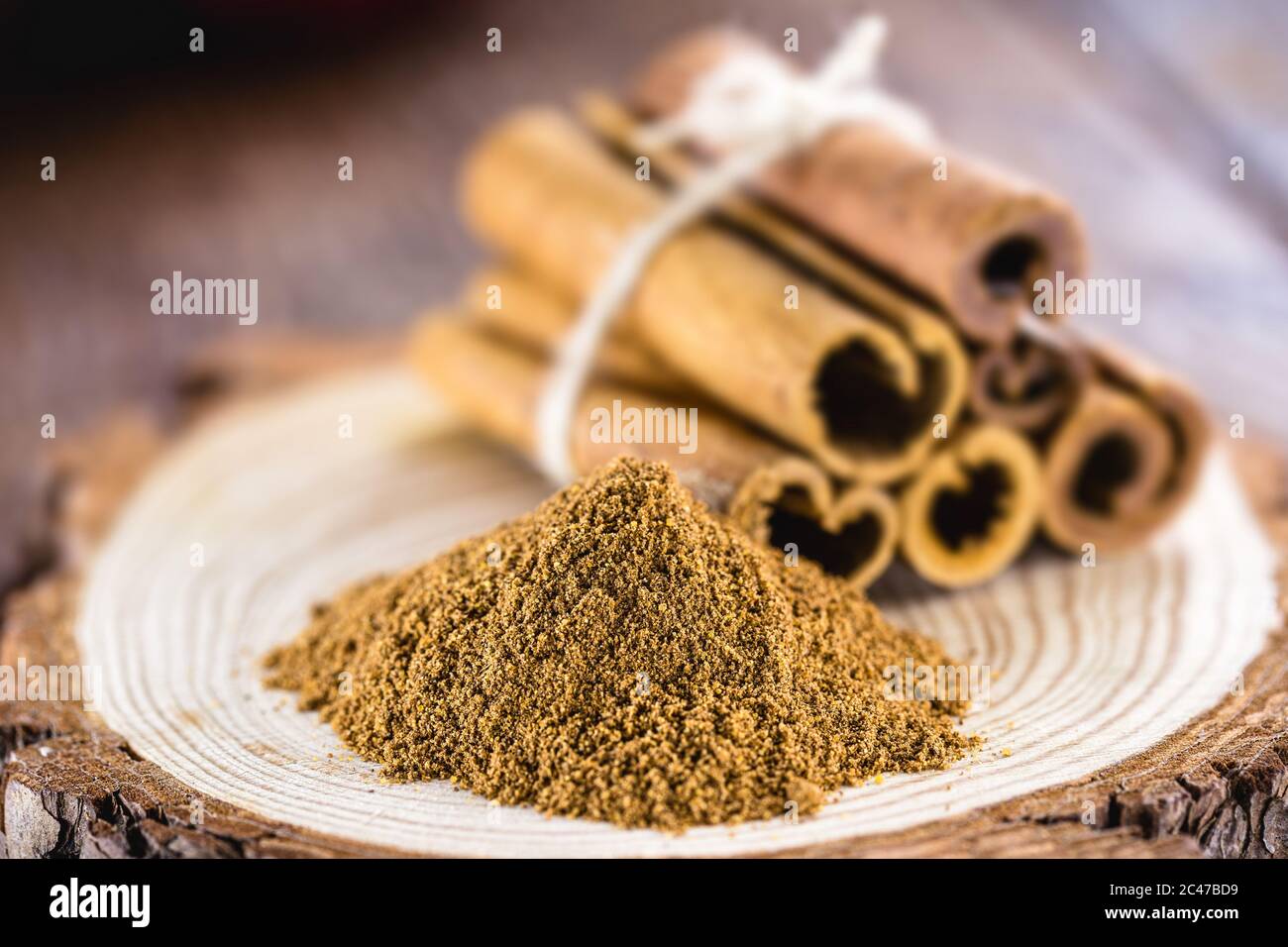 ground cinnamon and ground cinnamon, with a spot focus. macro ...