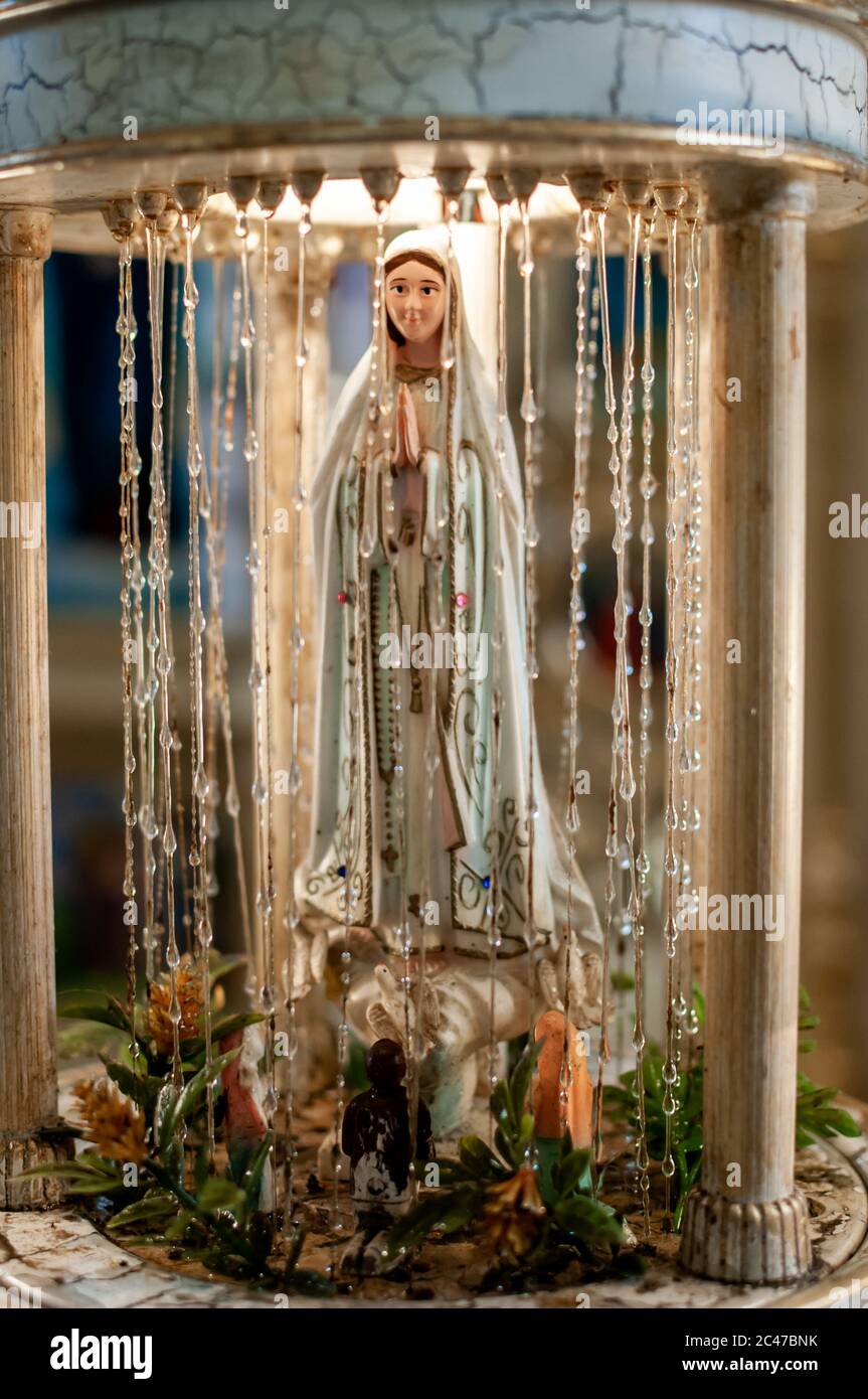 statue of Our Lady in the small altar Stock Photo - Alamy