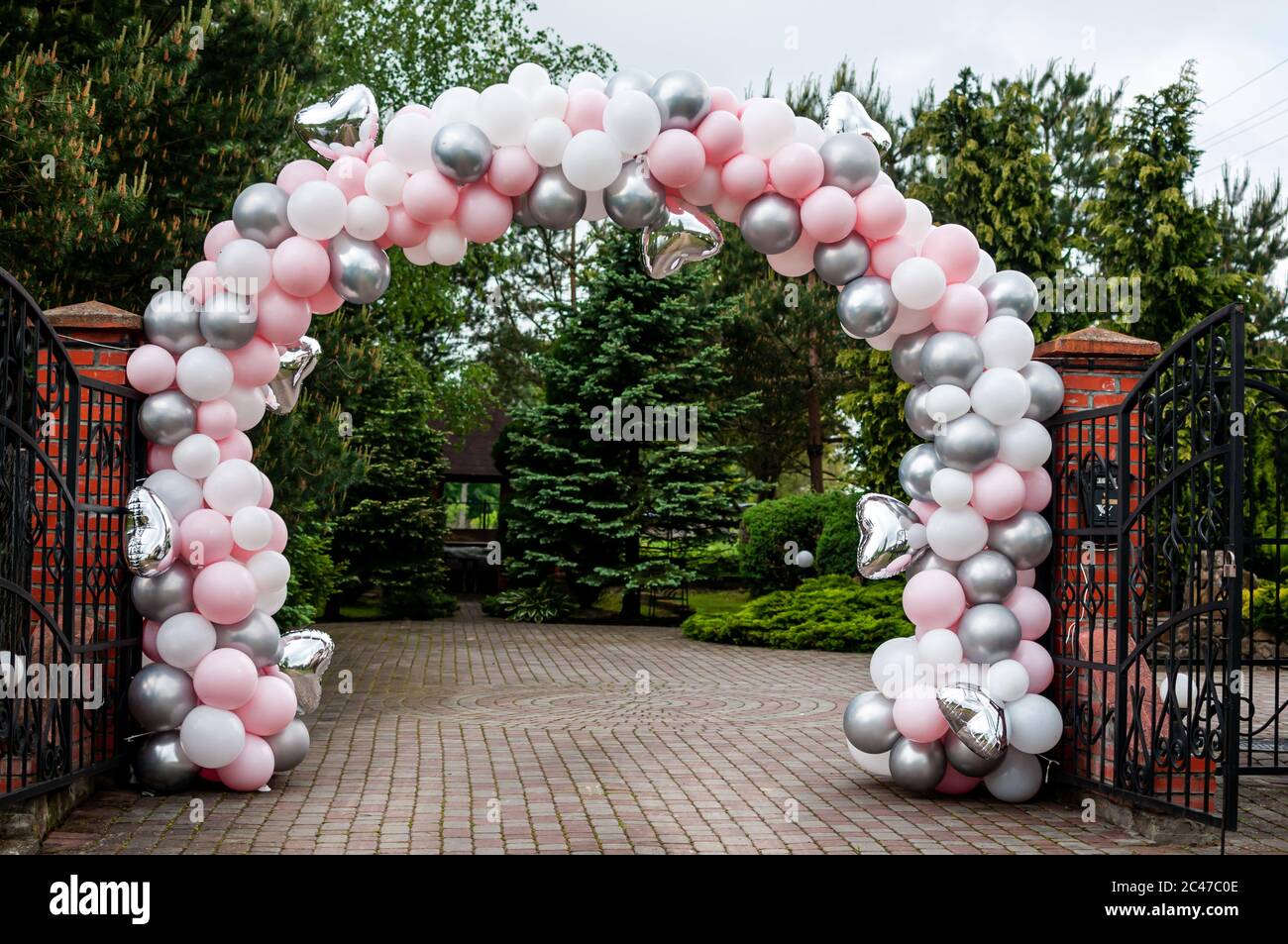 Wedding arch made of colorfull inflatable balloons Stock Photo - Alamy