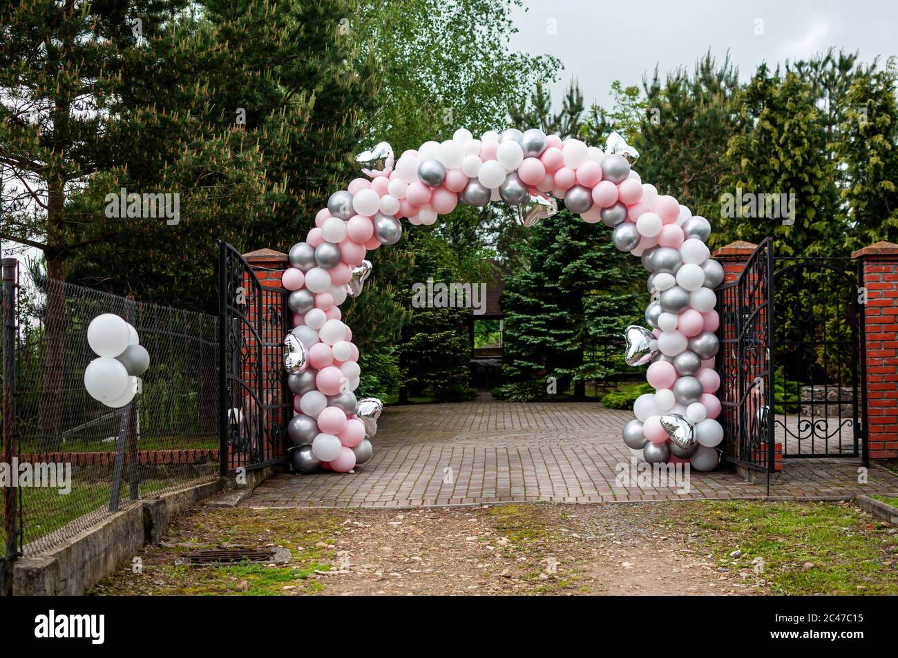 Wedding arch made of colorfull inflatable balloons Stock Photo - Alamy