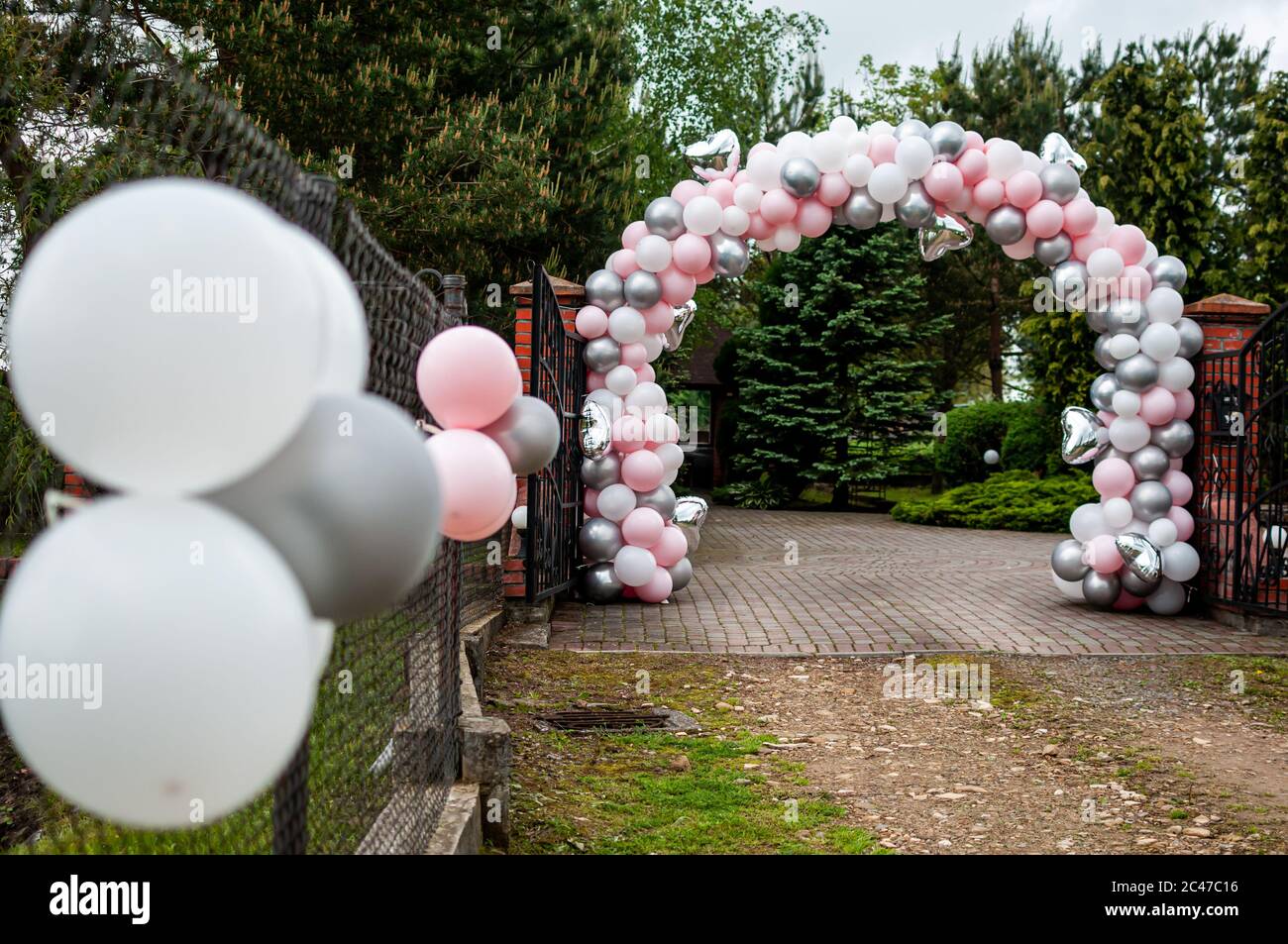 Wedding arch made of colorfull inflatable balloons Stock Photo - Alamy