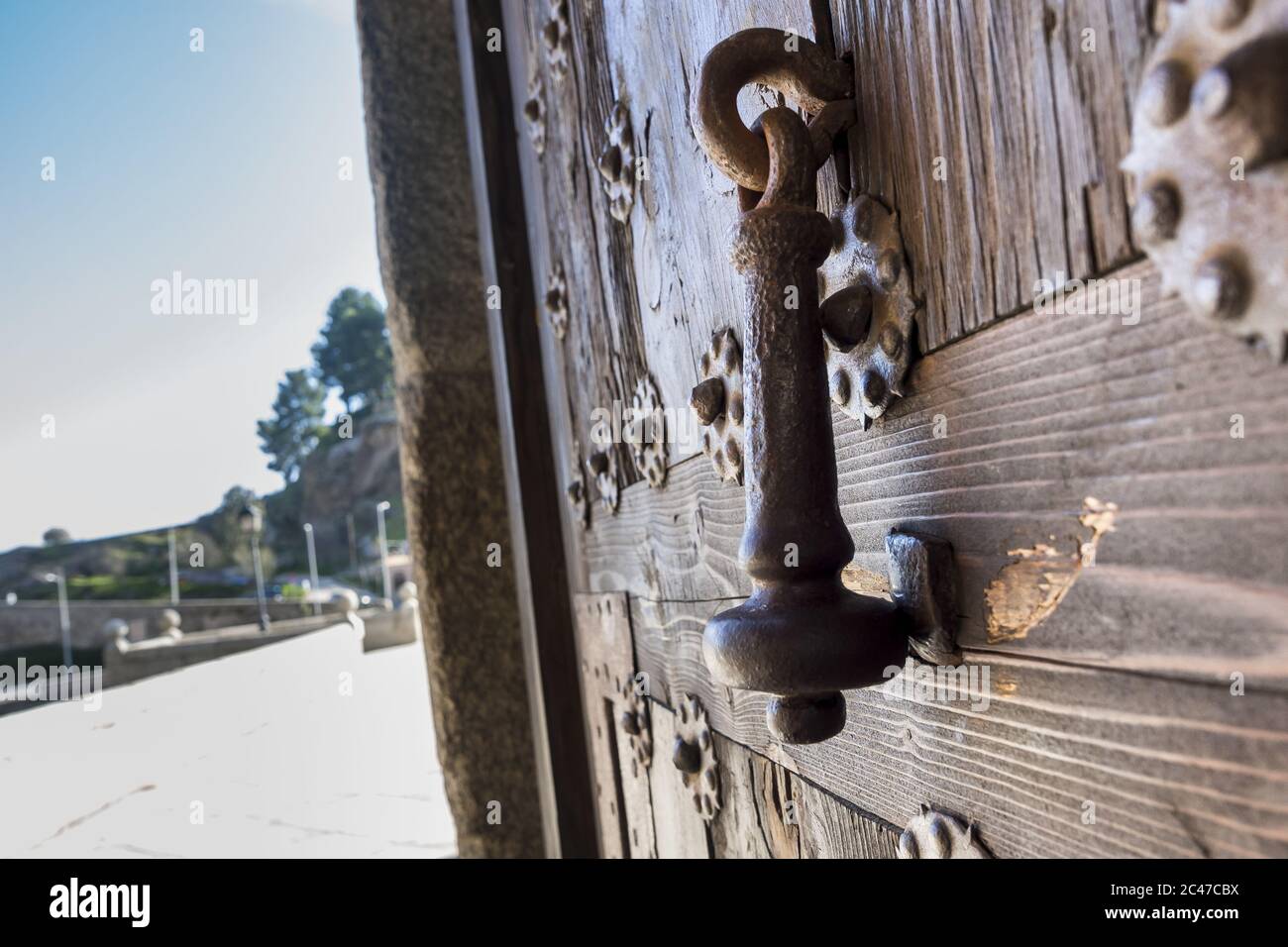 Metal door handle of an old castle Stock Photo - Alamy