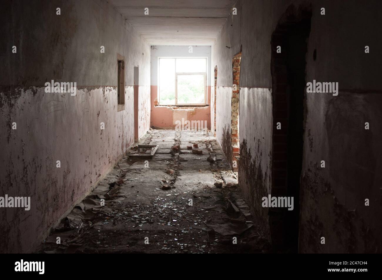 Abandoned rooms in the corridor of the abandoned office building Stock ...