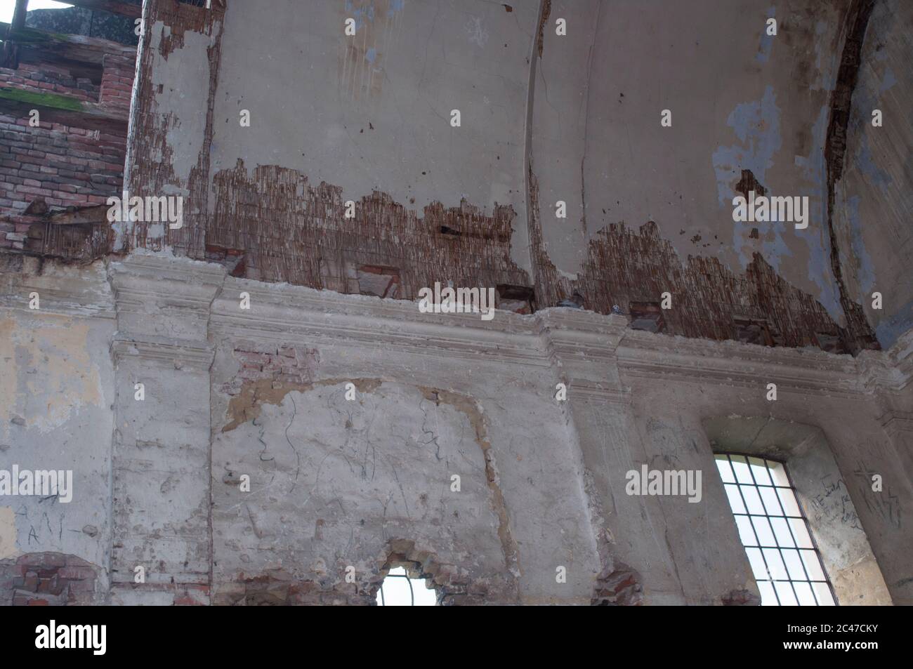 Wall with windows of ruined abandoned church Stock Photo - Alamy