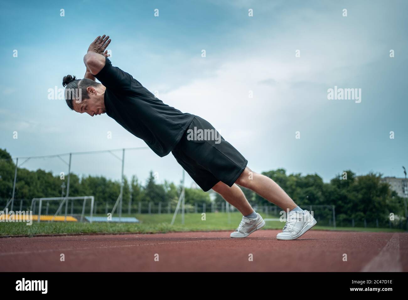 young athlete push up and jump at stadium outdoor Stock Photo - Alamy