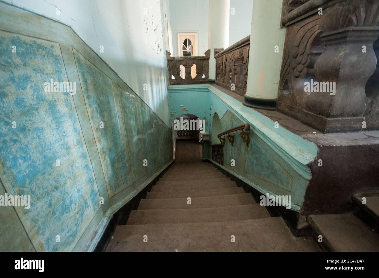 Abandoned wooden stairs in the blue hallway Stock Photo - Alamy