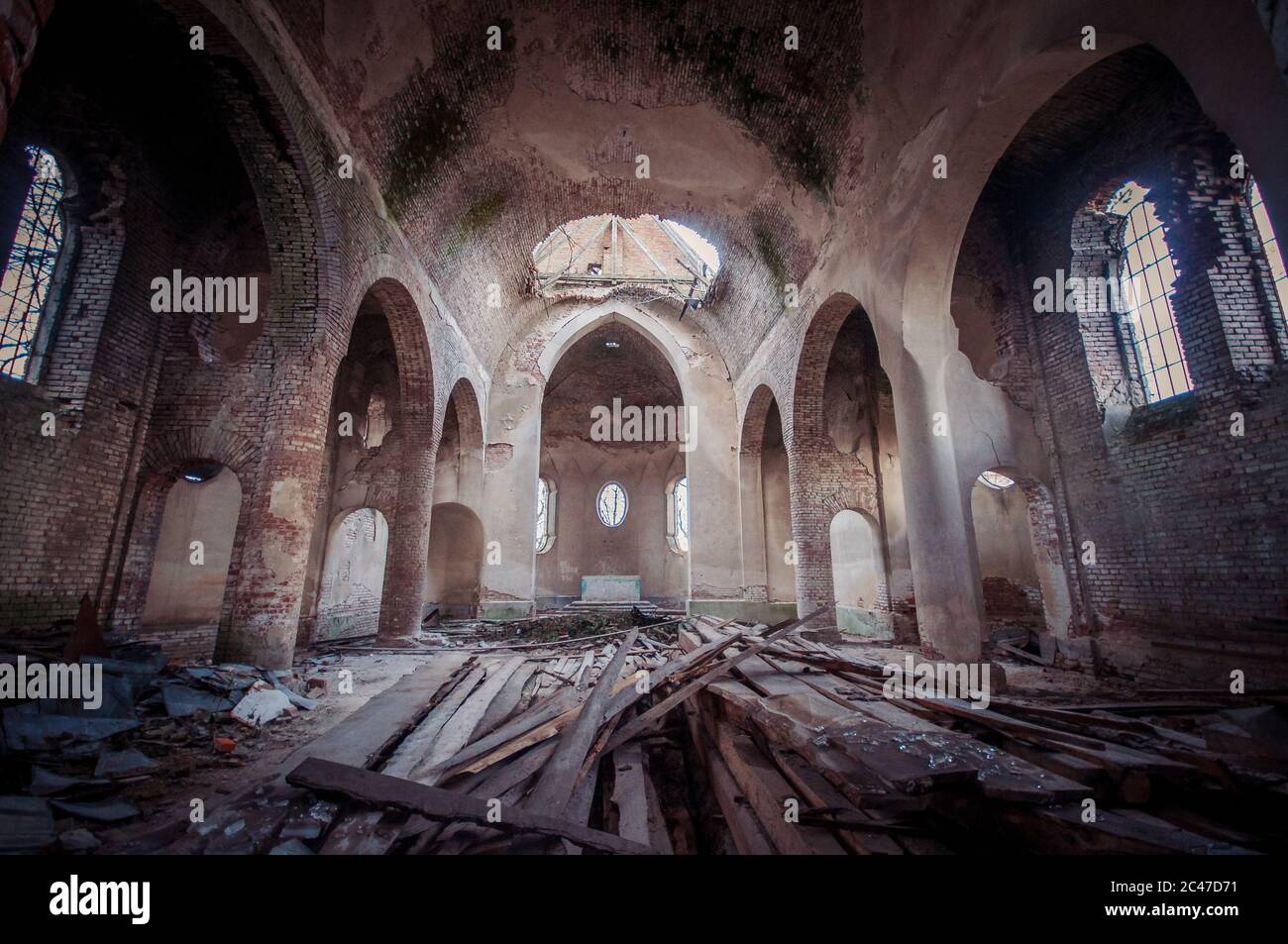 Hall of old abandoned church with wooden boards inside Stock Photo - Alamy