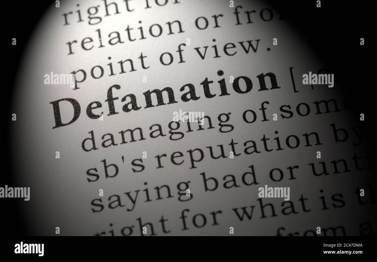 Fake Dictionary, Dictionary definition of word defamation Stock Photo ...