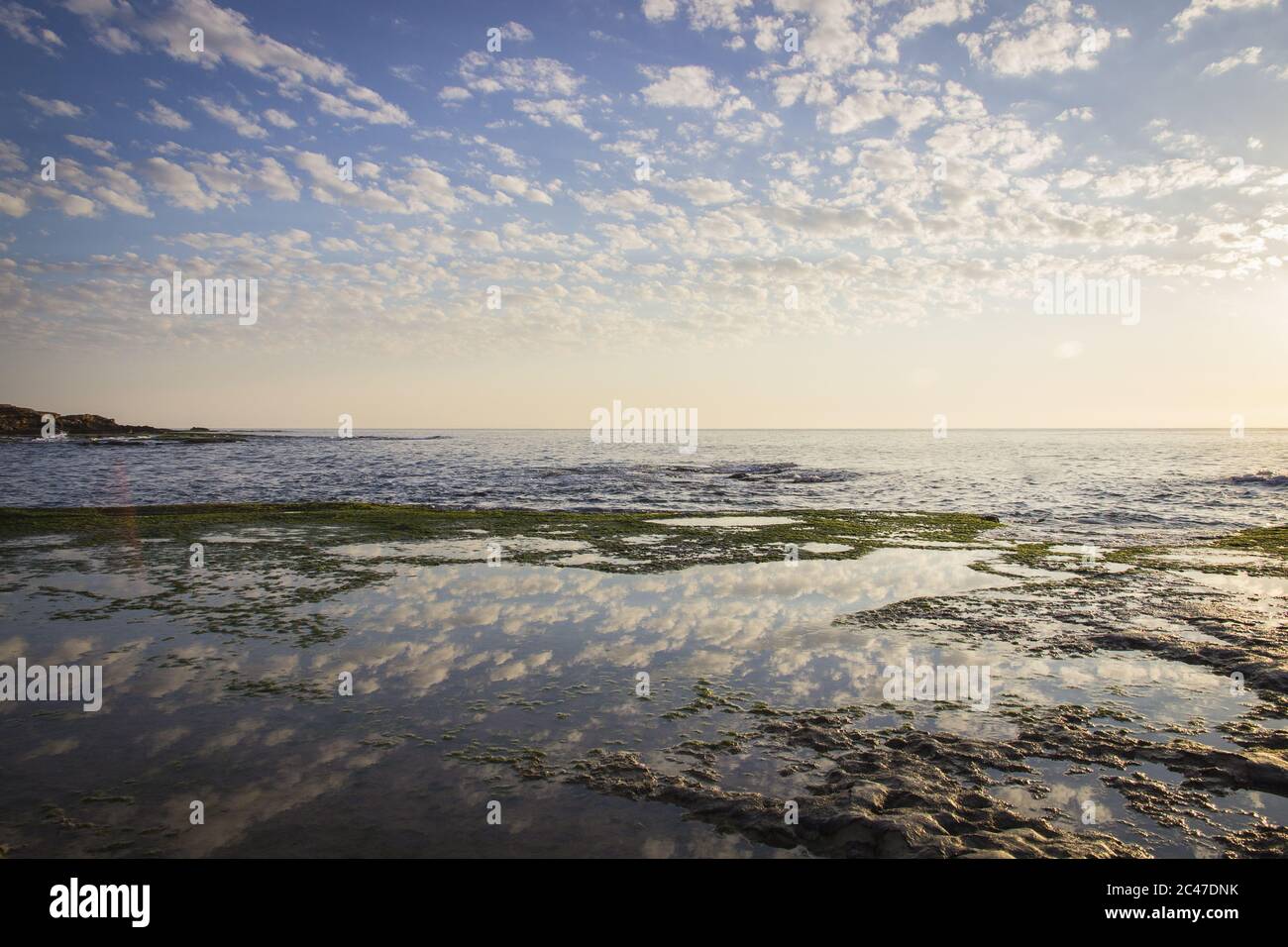 Mesmerizing view of a lake in harmony with the sky Stock Photo - Alamy