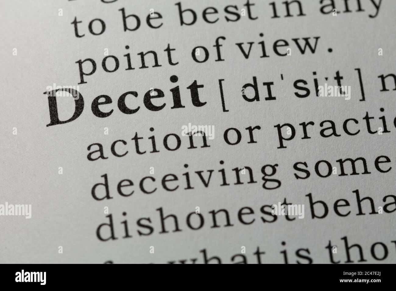 Fake Dictionary, Dictionary definition of word Deceit Stock Photo - Alamy