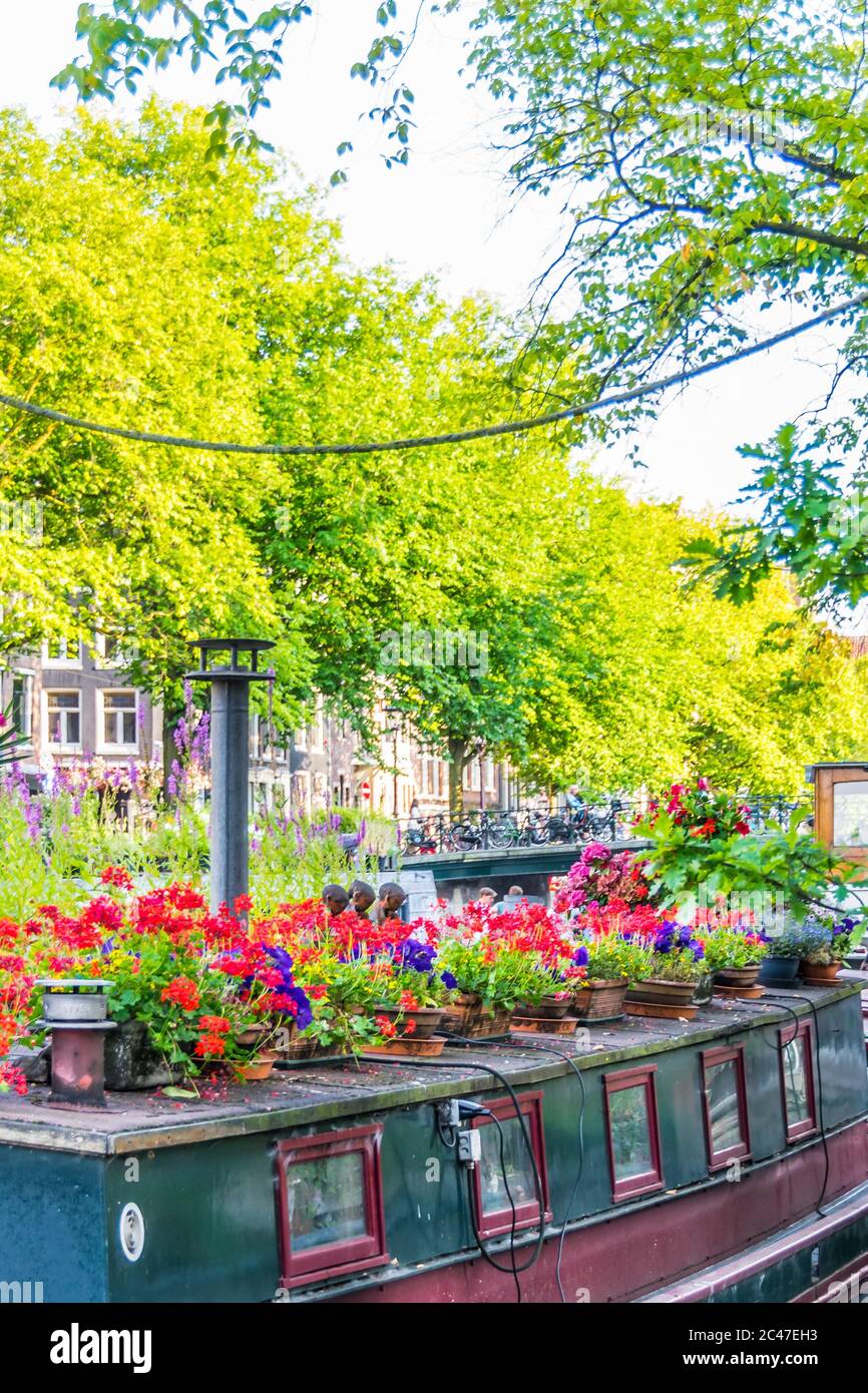 Amsterdam, Netherlands - July 19, 2018: Colorful boathouse with lots of ...