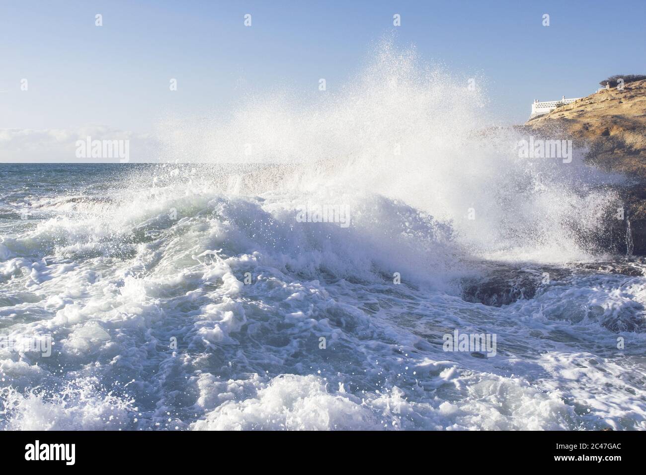 Beautiful scenery of waterfall in the sea with rock formations at ...