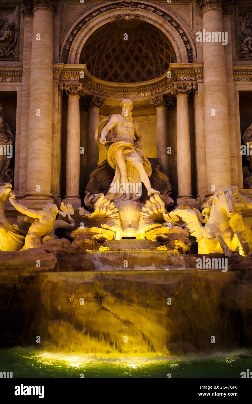 Neptune in its Trevi fountain with its night lighting in Rome, Italy ...
