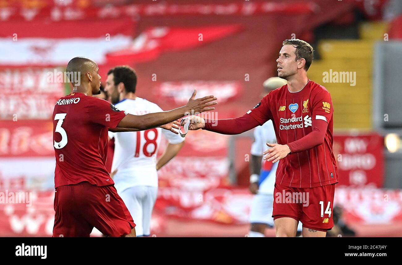 Liverpools jordan henderson passes captains armband hi-res stock ...