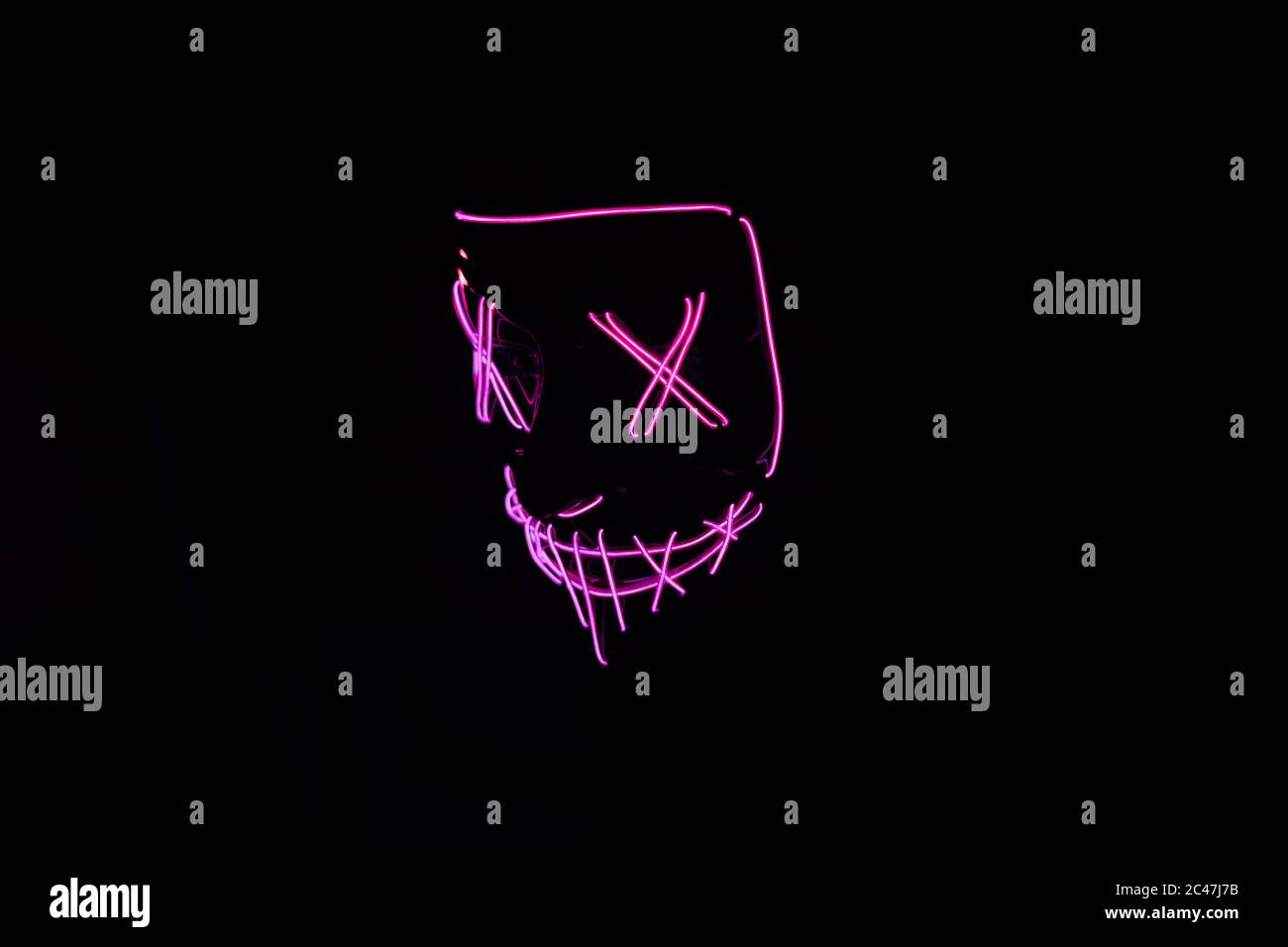 Closeup shot of a pink purge led mask isolated on a black background ...