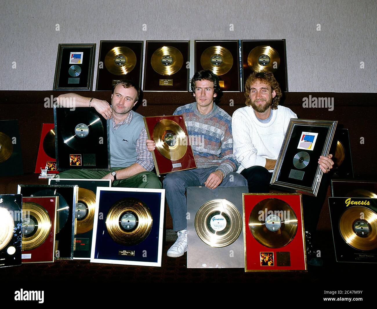Genesis receiving gold discs backstage at the NEC Birmingham 26th ...