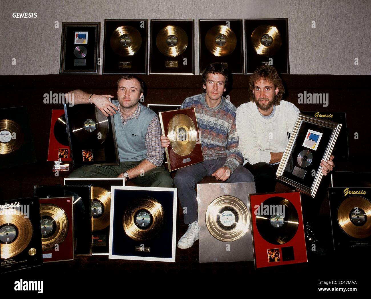 Genesis receiving gold discs backstage at the NEC Birmingham 26th ...