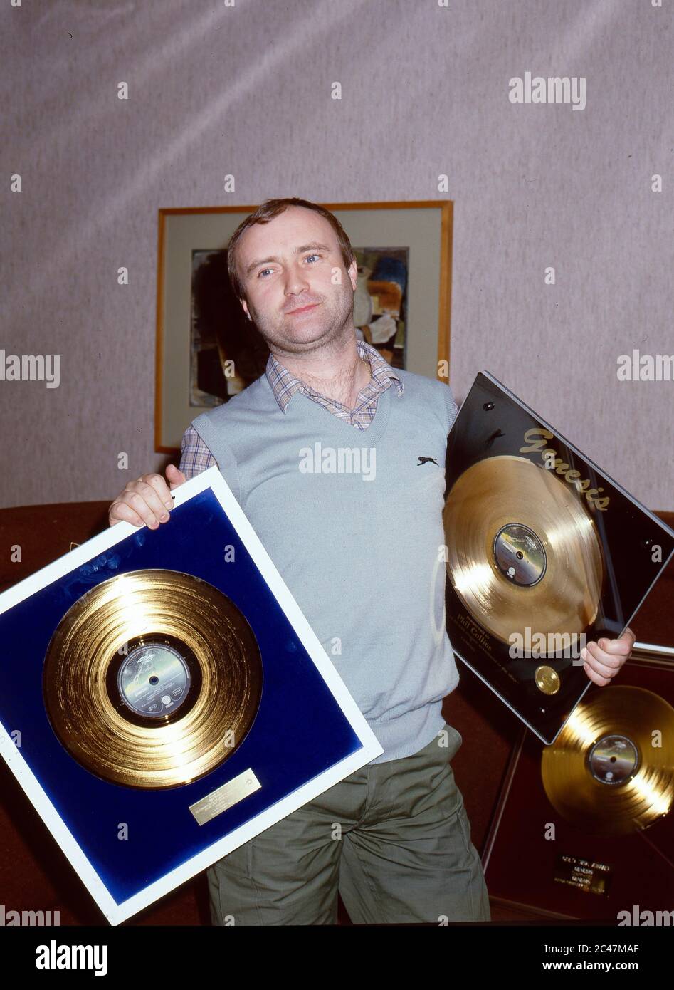 Genesis receiving gold discs backstage at the NEC Birmingham 26th ...