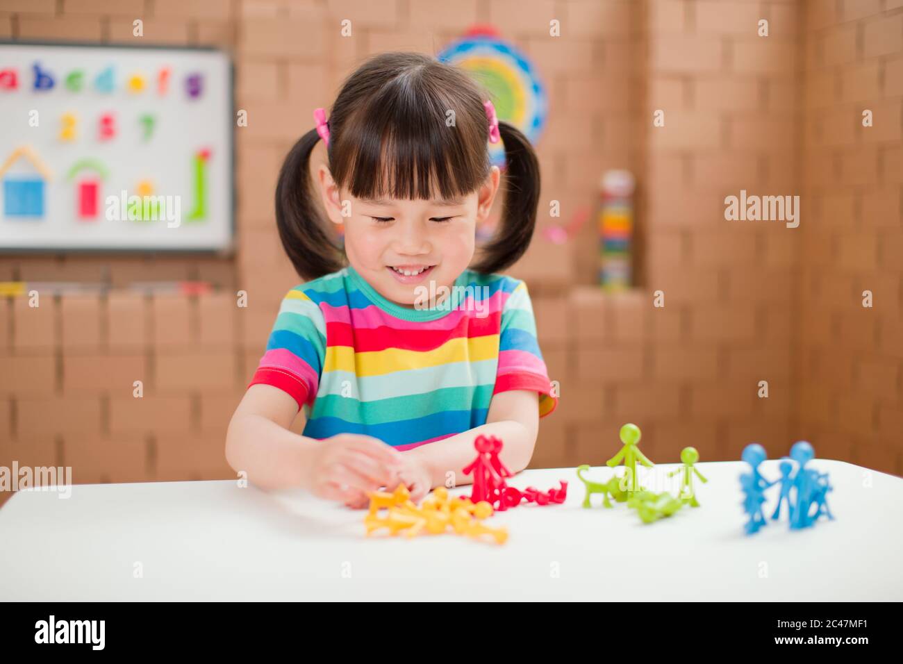 toddler girl learning counting and math for homeschooling Stock Photo ...