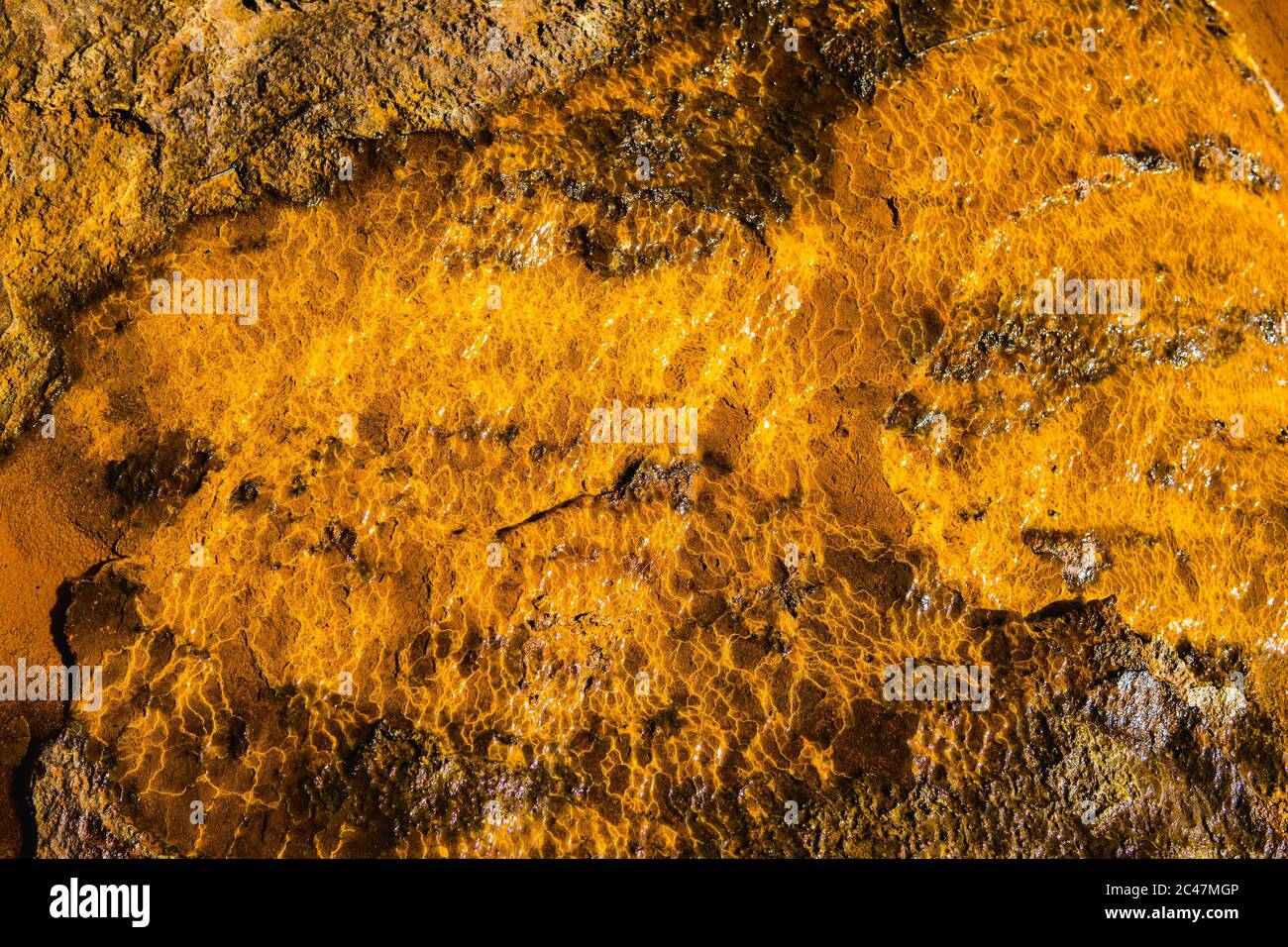 Top view shot of water flowing over the rock in a river bed in Rio ...