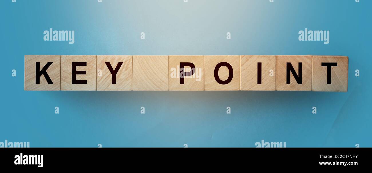 Key Point on cube wooden blocks on blue background. Business success ...