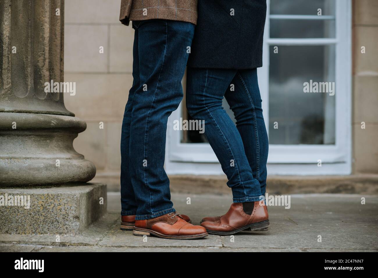 Lovely young romantic couple standing hi-res stock photography and ...
