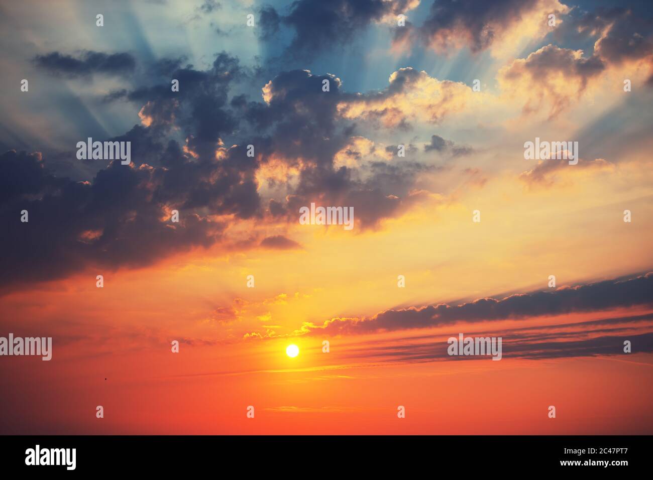 Cloudscape and dramatic orange sky, sunset shot Stock Photo - Alamy