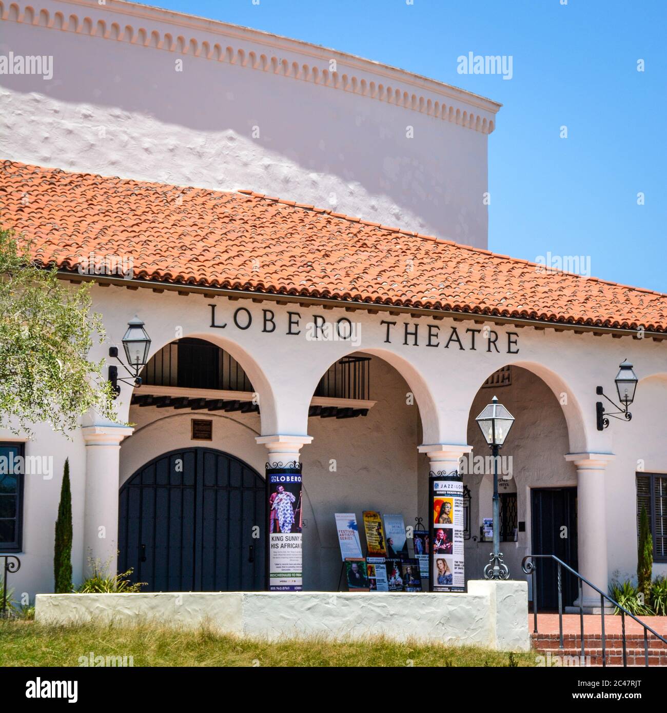 Entrance to the Spanish Colonial revival style Lobero Theatre with red ...